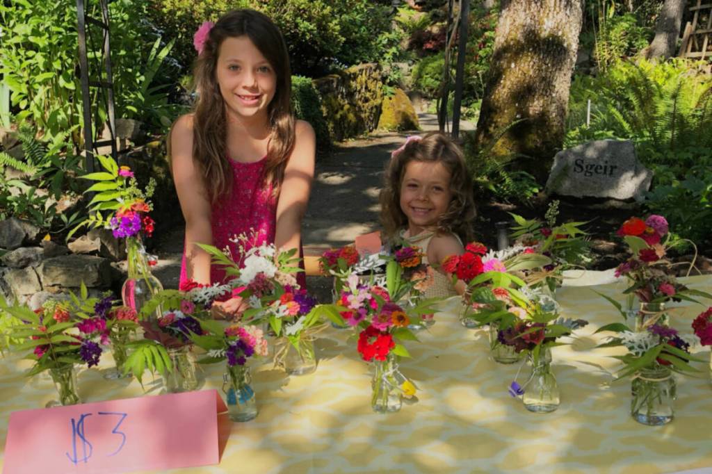 Girls sell nana’s flowers in Greater Victoria to raise $375 for kids ...
